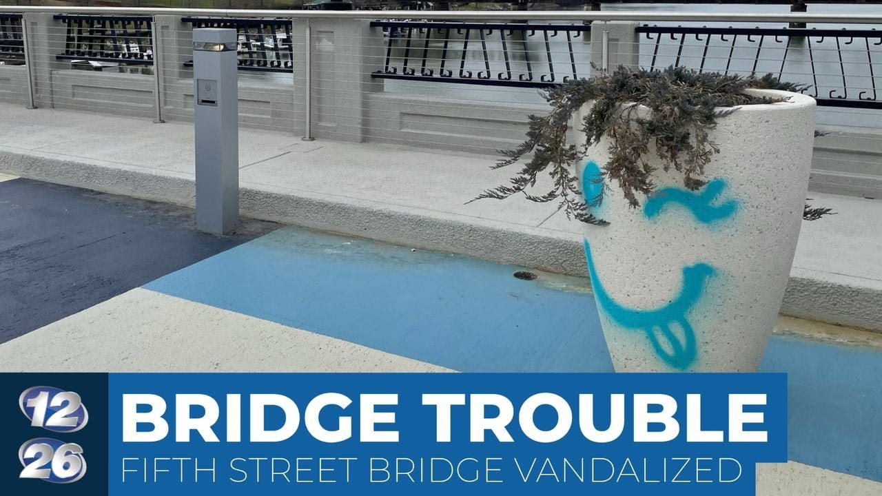 Fifth Street bridge hit with graffiti; service line breaks - YouTube