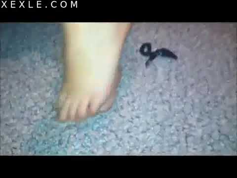 Friends remove sleeping girl's socks