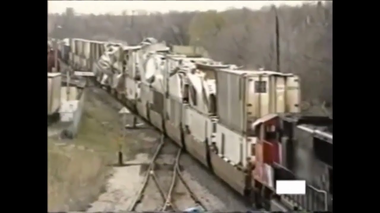 Train Cars Crushed From Low Clearance Bridge - YouTube
