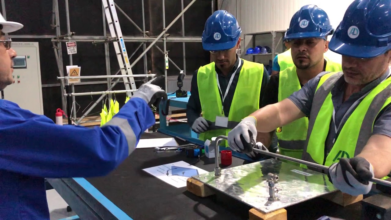Al Delma small bore tubing installation training - YouTube