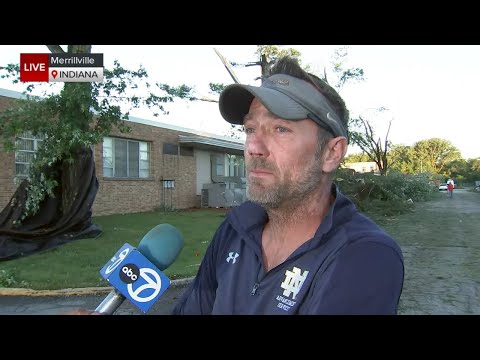 Employee of Ind. HS fights back tears after surveying storm damage