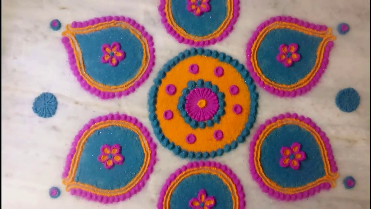Rangoli with many colors - YouTube