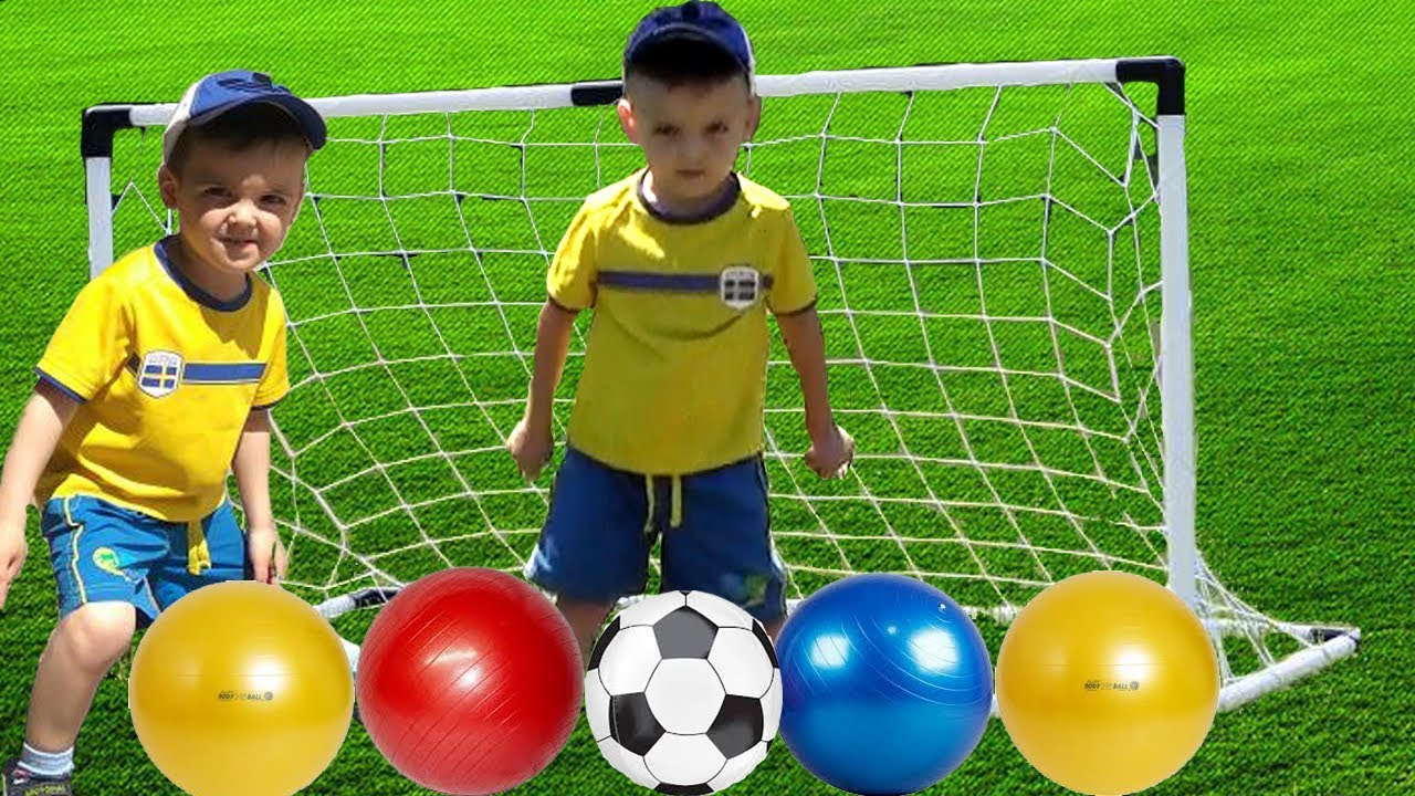 Kids play football with colorful balls for children - YouTube