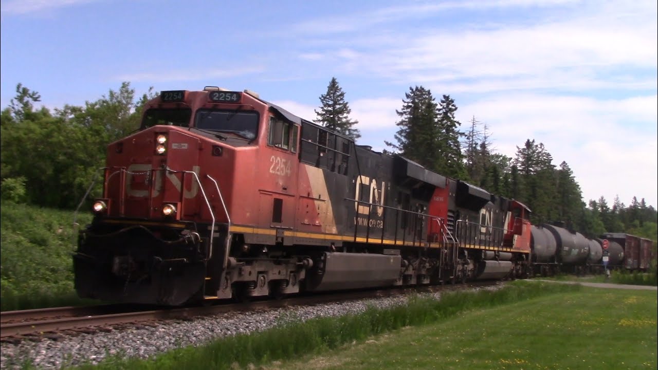 ES44DC Gevo 2254 Leads a Short Manifest Train CN 594 West pass Boundary ...