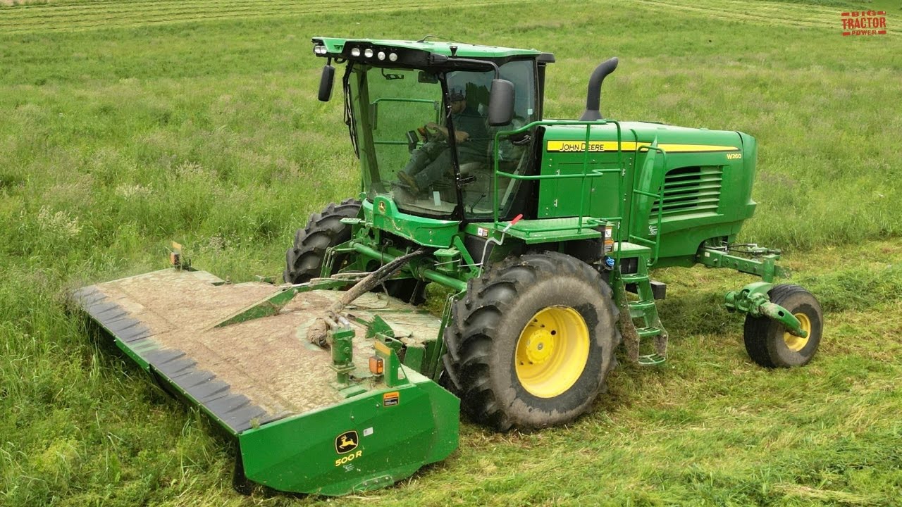 JOHN DEERE W260 Windrower Mowing Hay - YouTube