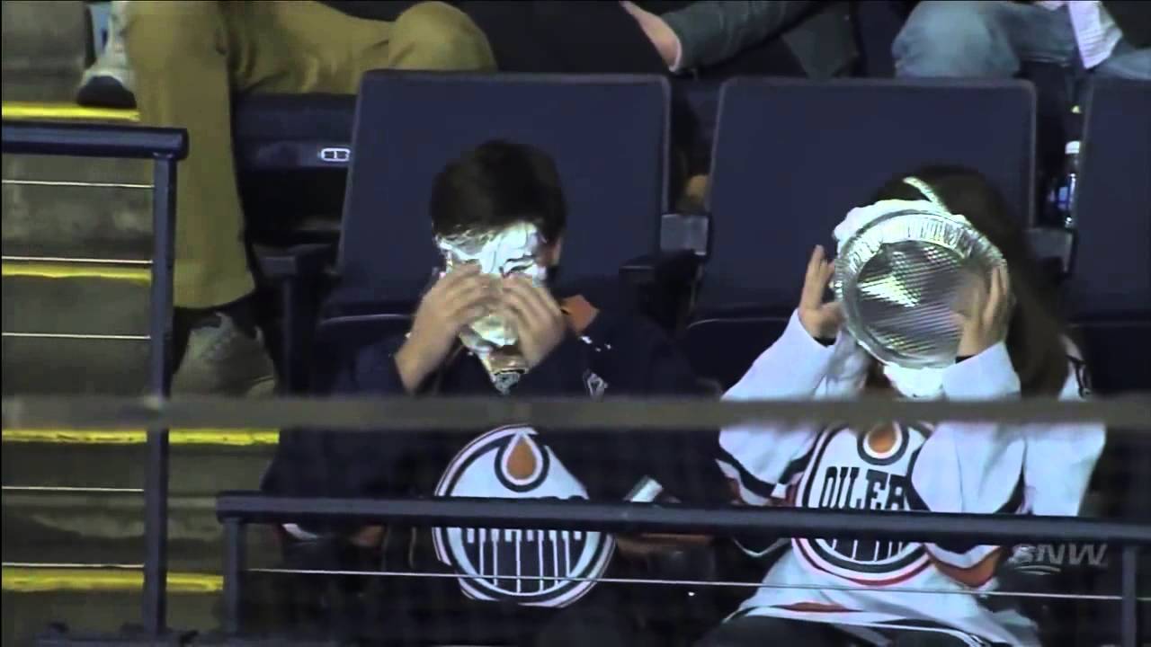 Edmonton Oilers fan gets pie in the face - YouTube