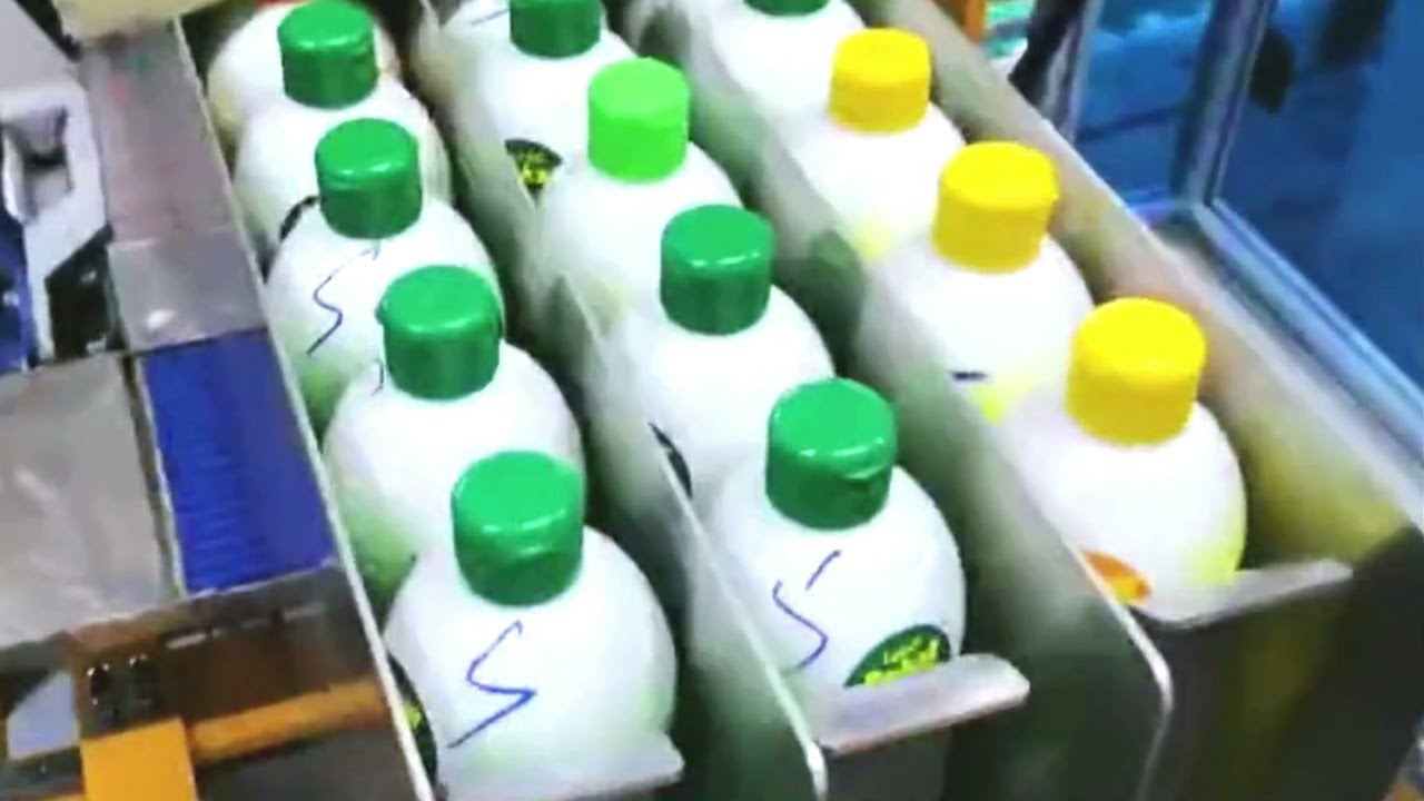 automatic cartoning machine for juice bottles packs drop type feeding ...