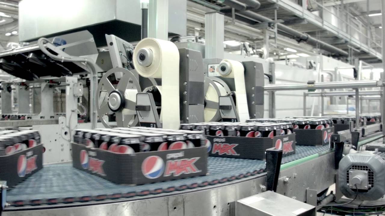Evolabel Tamp Applicator Labelling System at Carlsberg - YouTube