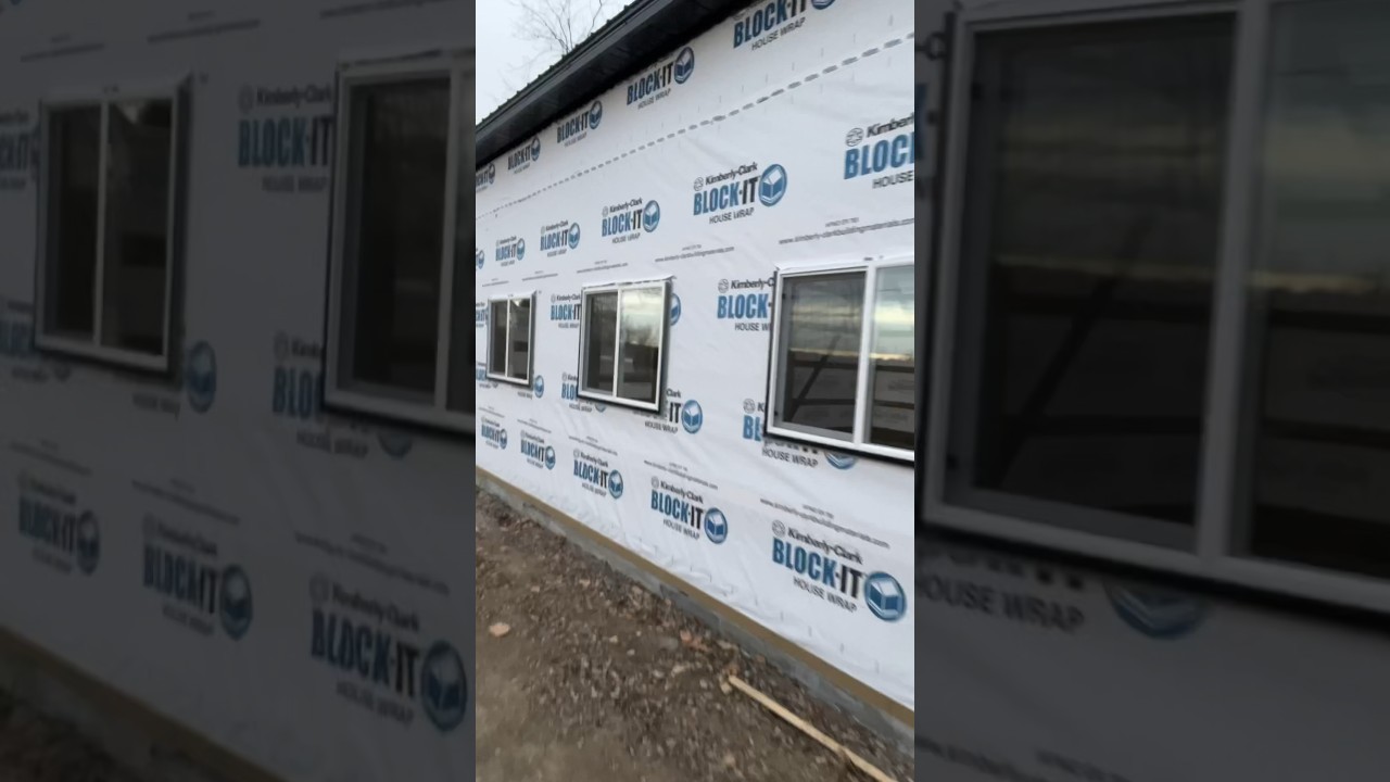 All 7 windows installed, and black J trim wrapped on the sides and ...