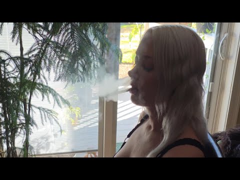 Smoking Girl - Speed smoking side view nose exhales