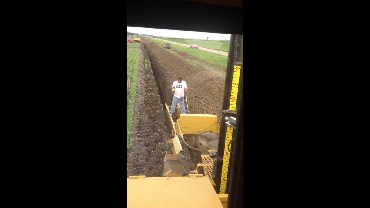 Tightline Drainage - Port Hydromax Wheel Trencher - Install - YouTube