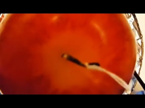 Poking aluminum foil sound w/apple candle - YouTube