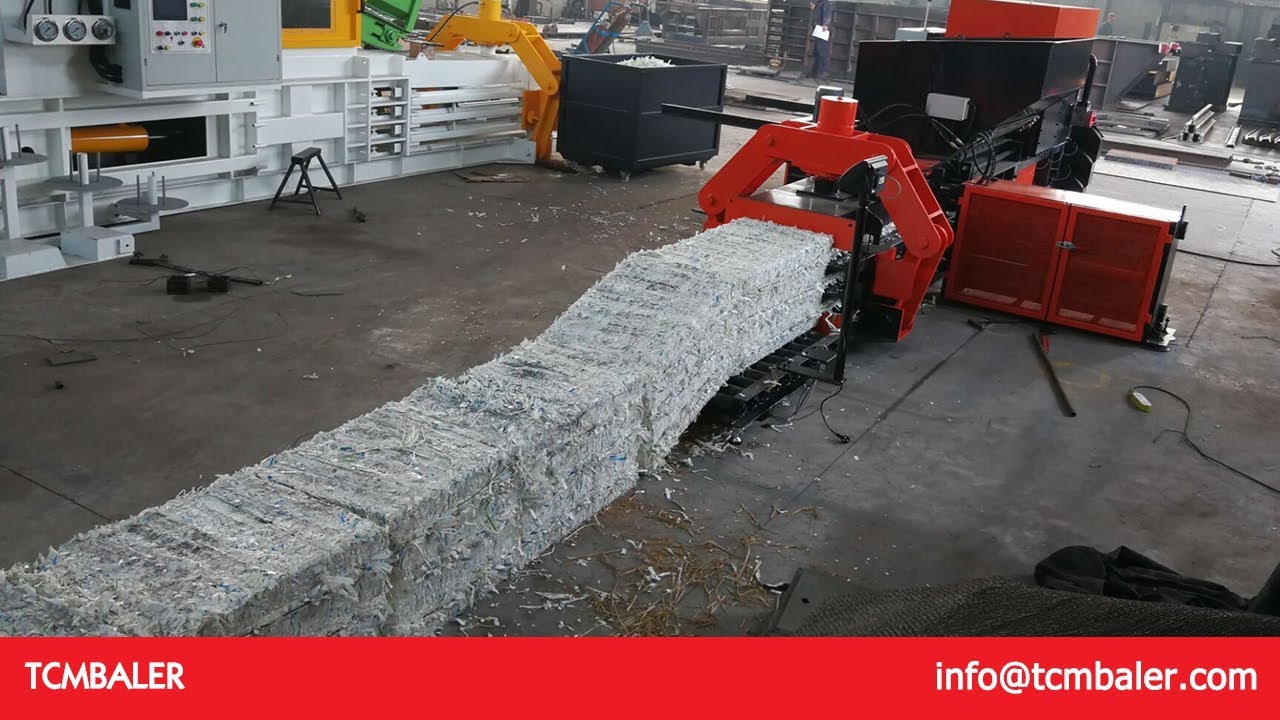 horizontal hydraulic compactor for newspaper - YouTube