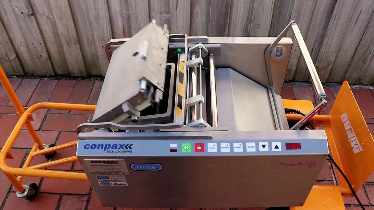Conpax, semi-automatic packaging machine - YouTube