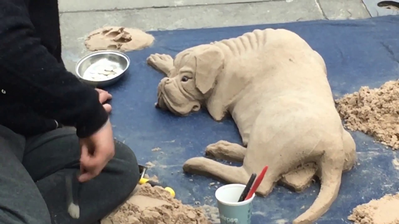 Sand Dog Sculpture Street Performer in Oxford Street - YouTube