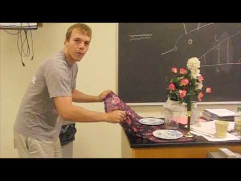 Inertia and the Tablecloth Trick - YouTube