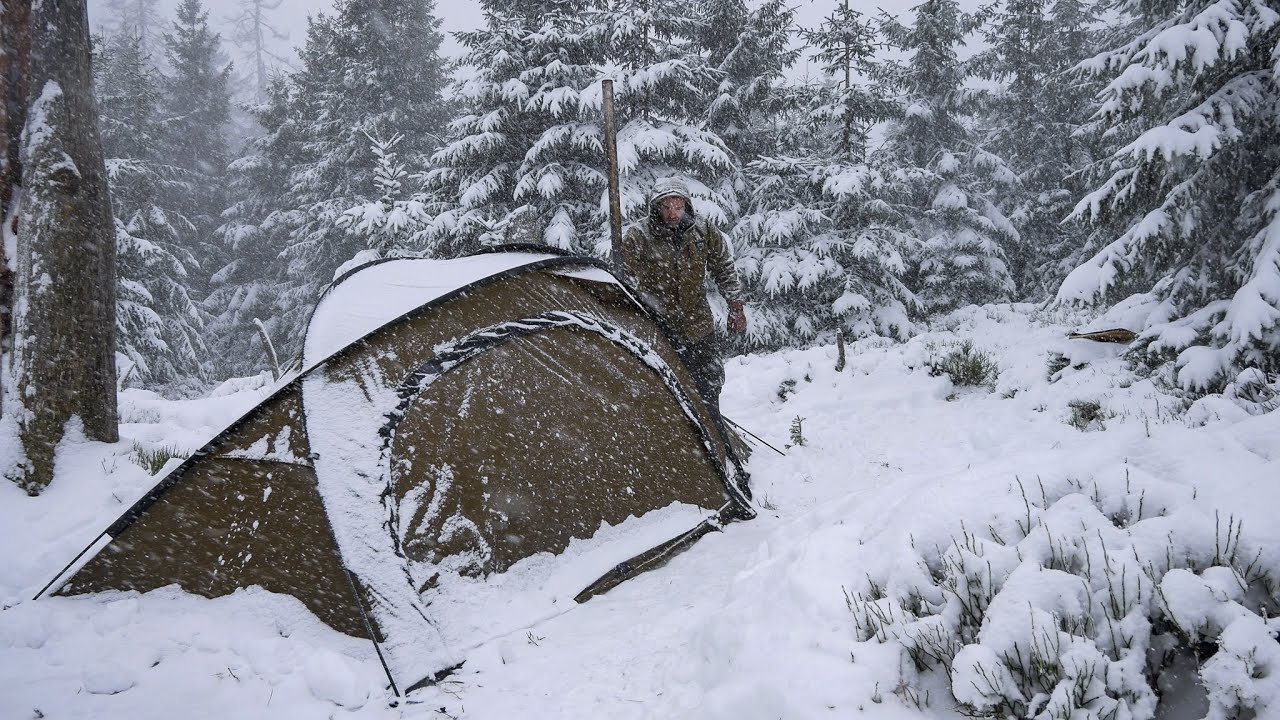 Hot tent winter solo overnighter in deep snow - YouTube