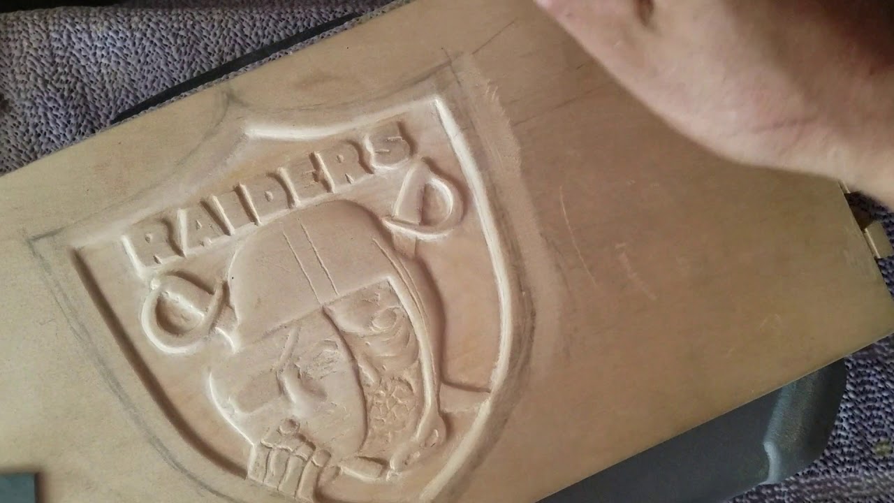 The Raiders carving on Wood - YouTube