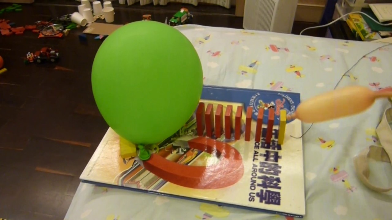 The creative balloon domino trick ( record 2017 ) - YouTube