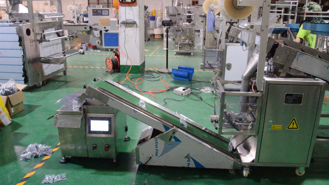 Four vibration disk packing machine +Conveyor+Weighing machine - YouTube