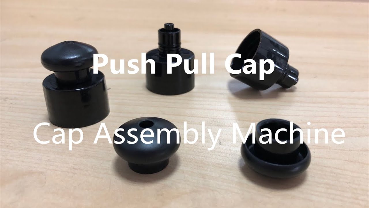 Push pull cap assembly machine - YouTube