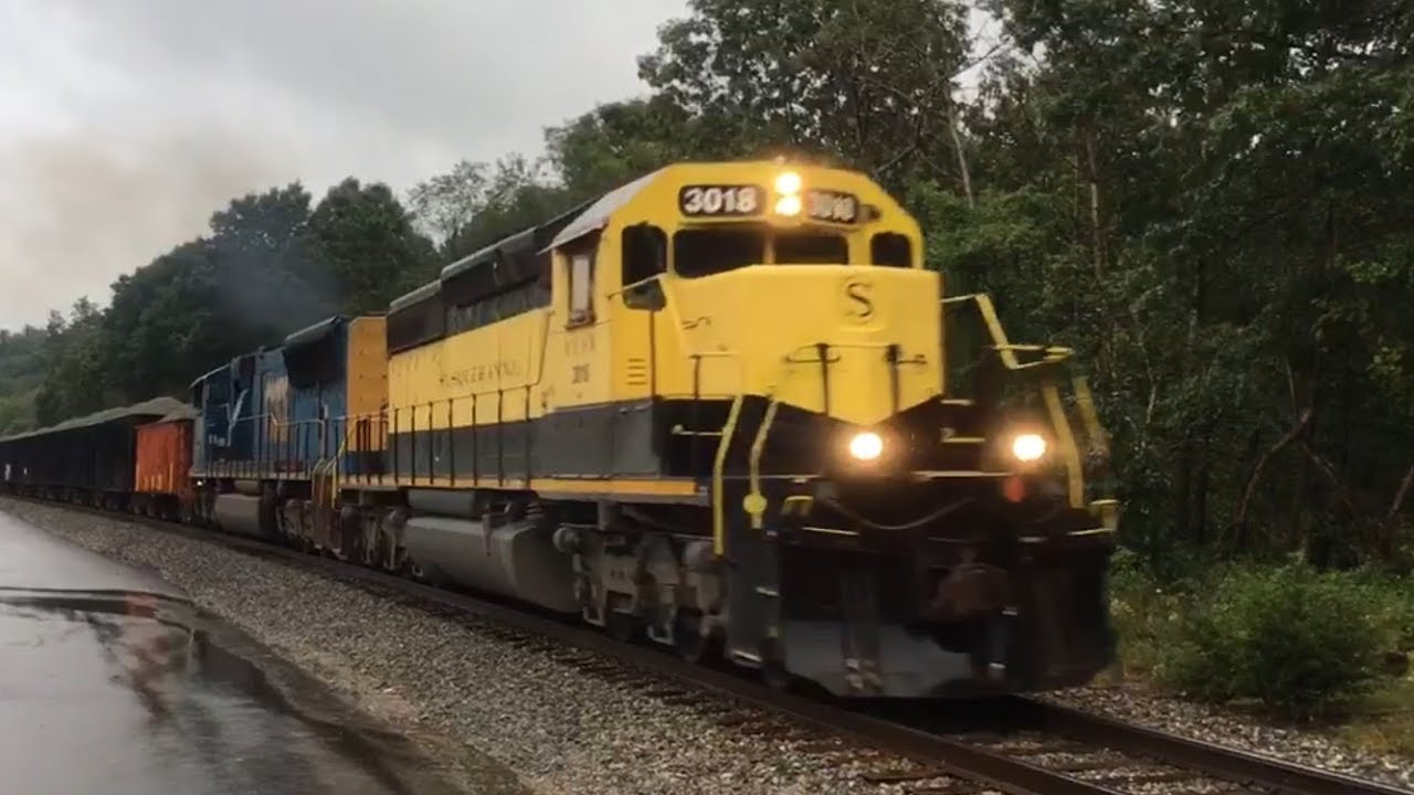 NYS&W #3018 and CSX #4769 Hauling Stone Hoppers - YouTube