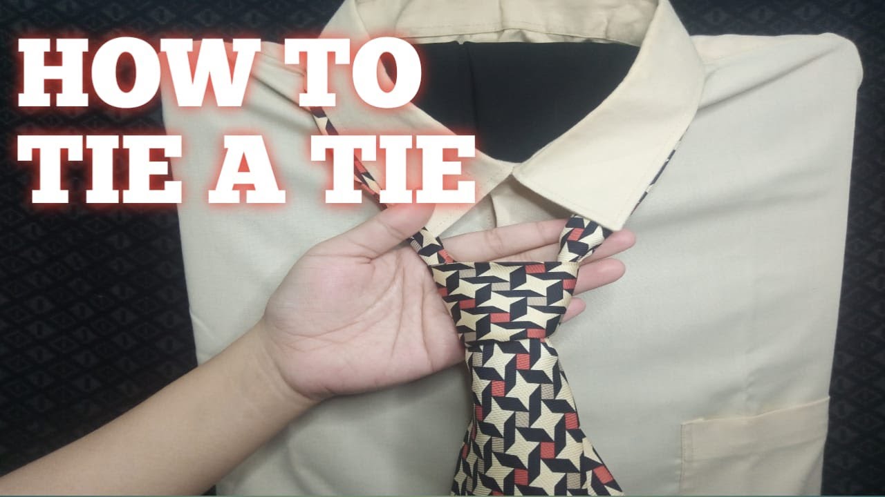 Tutorial On Tying A Tie For Beginners - YouTube