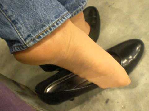 Candid jeans and nylons shoeplay