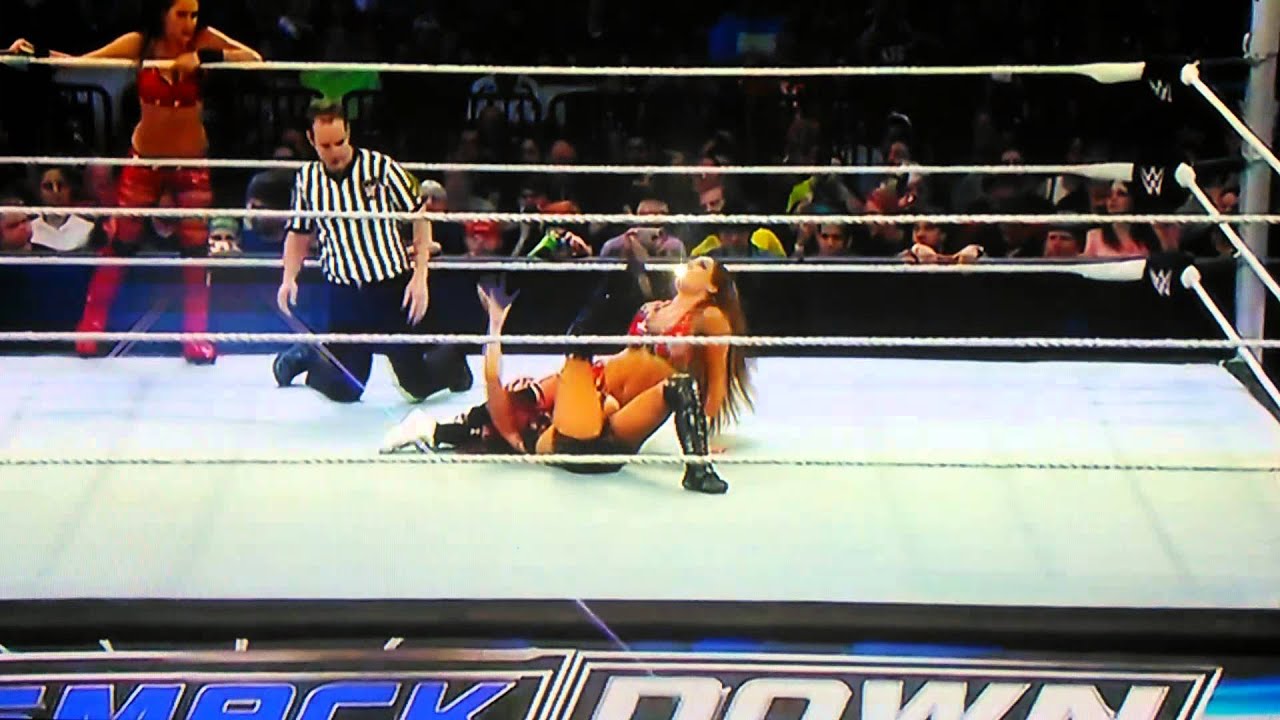 Nikki Bella headscissors on Sasha banks - YouTube