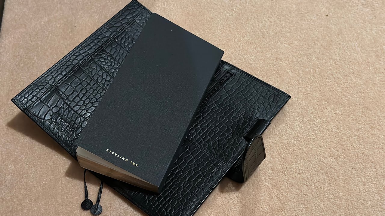 Sterling Ink Weeks Notebook set up with date stickers - YouTube