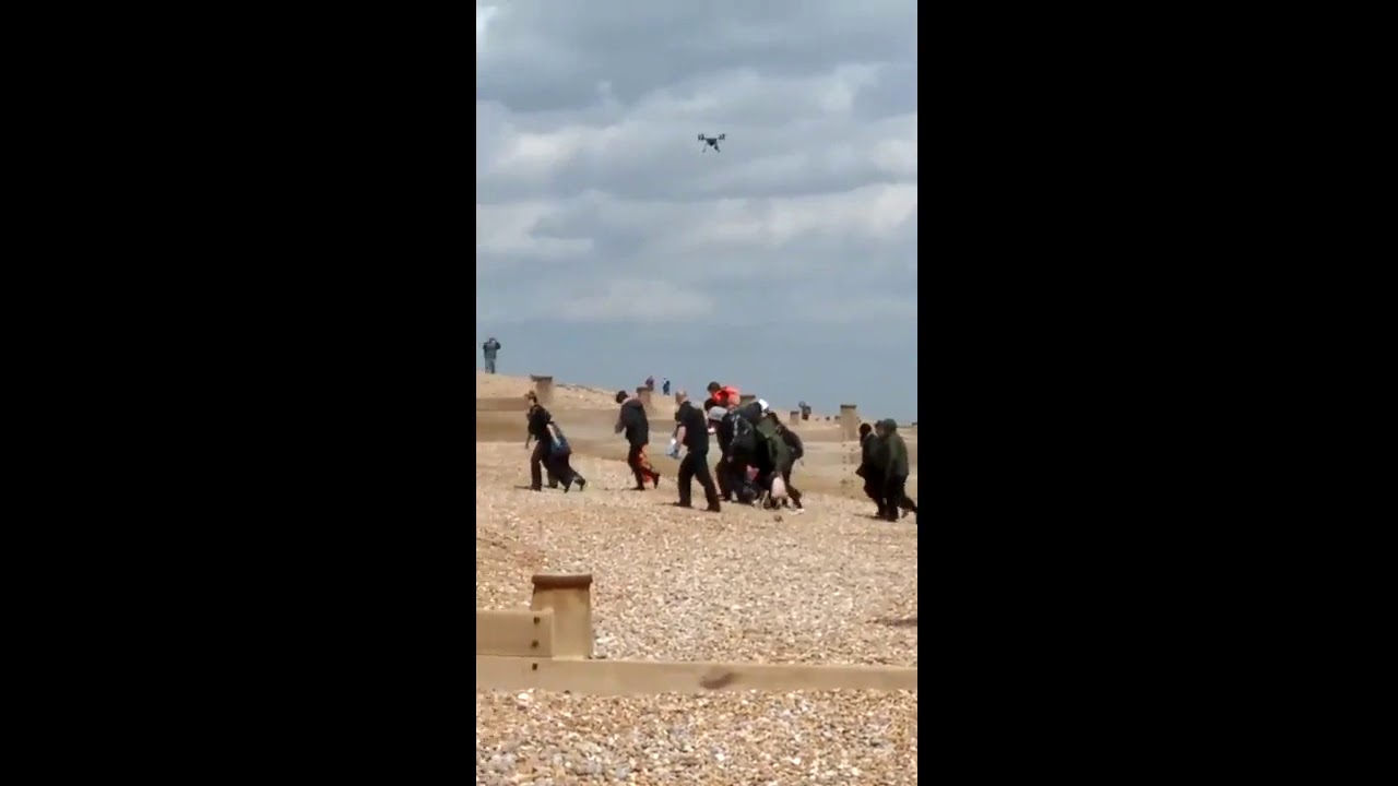 Illegal immigrants land on UK beach escorted by UK Border Farce - YouTube