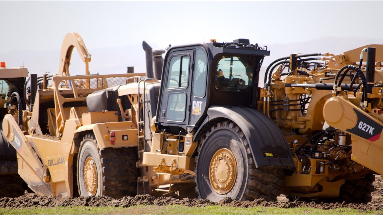 CAT 627H & K push pulling in California - YouTube