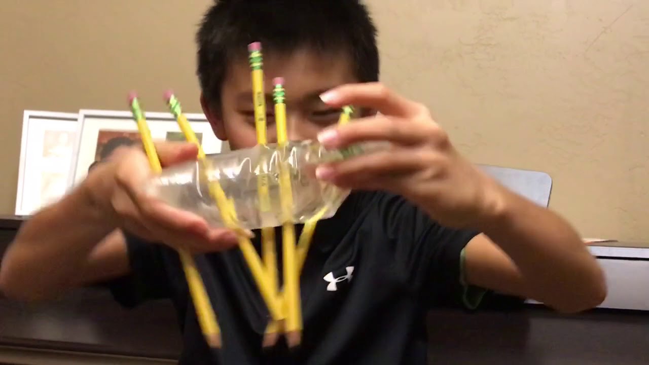 Science stabbing pencils through a bag of water - YouTube