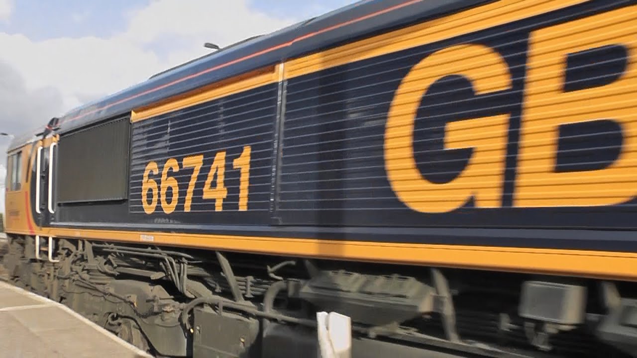Class 66 66741 works a container train through Collingham Station 18/09 ...