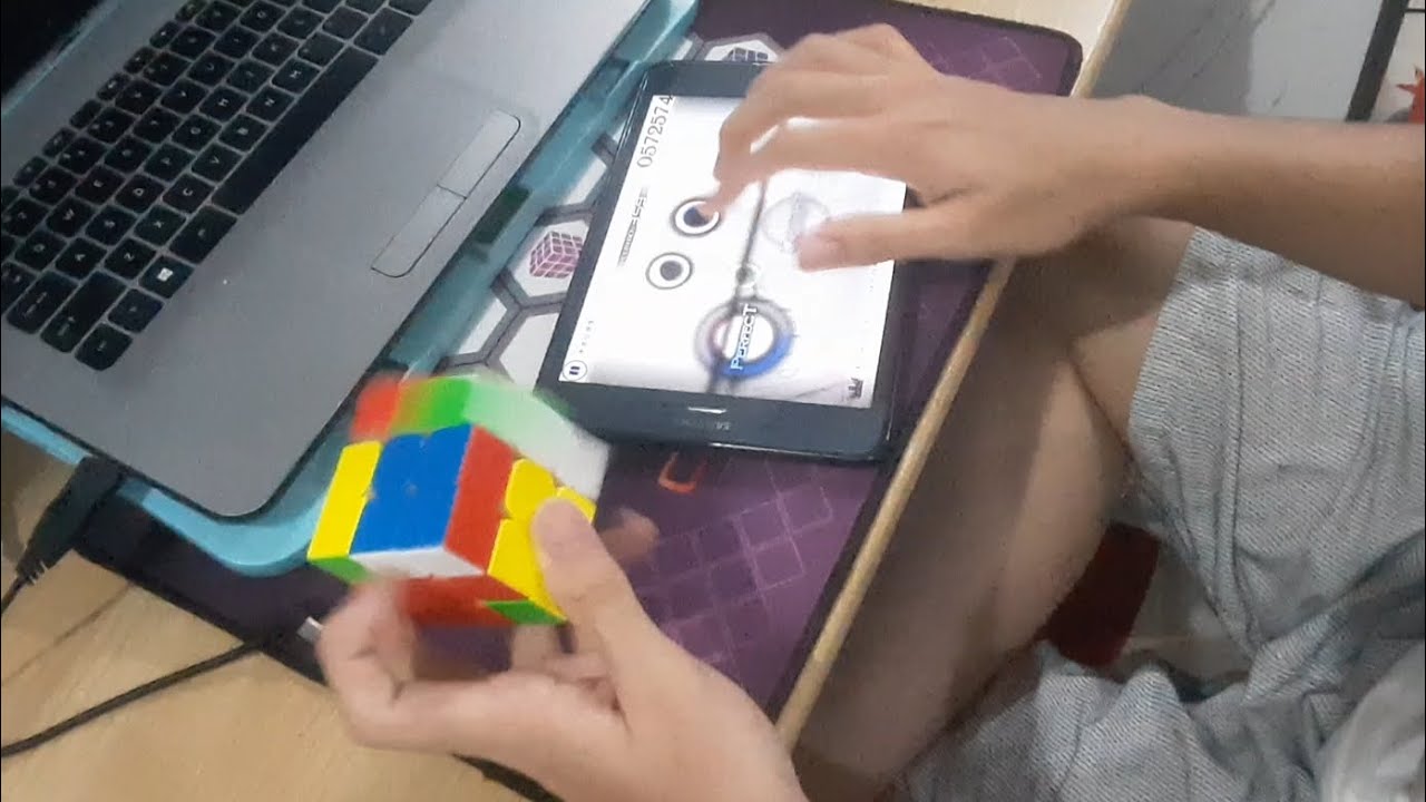 Solving A Rubiks Cube One Handed While Full Comboing A Rhythm Game On ...