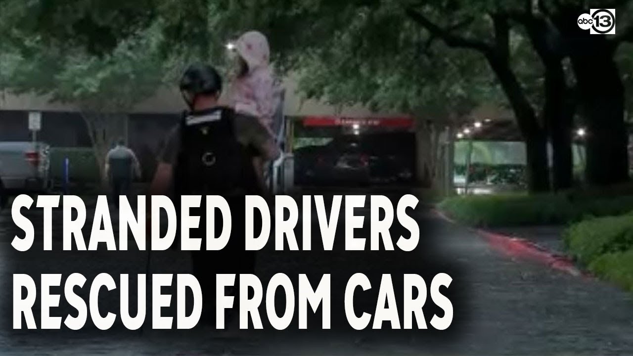 Stranded drivers rescued from cars - YouTube