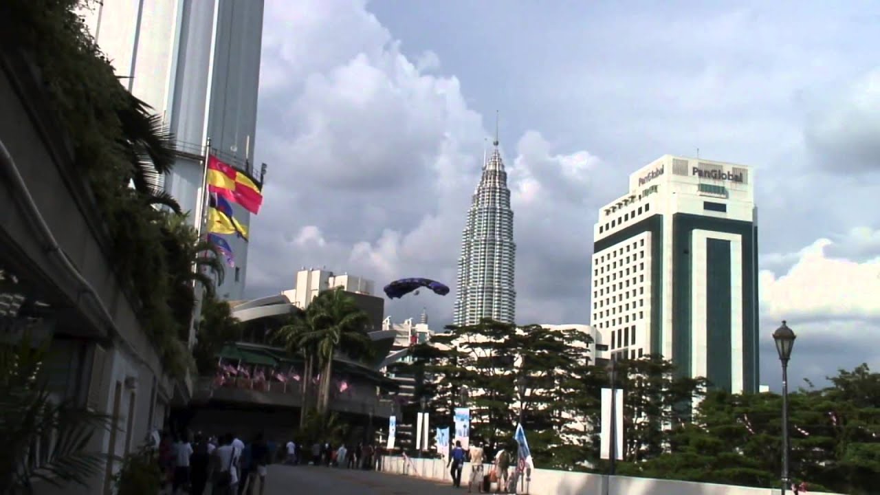 BASE Jumping First? Zip Line landing at the KL Tower - YouTube