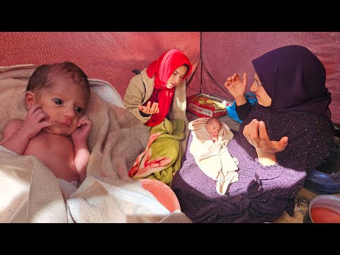 Giving birth in Mount Nejat, Fatima and her fetus