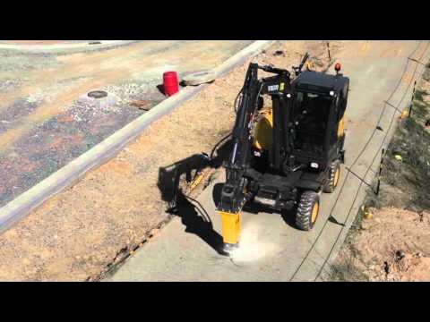Video Promo Compact Wheeled Excavator EW60E - YouTube