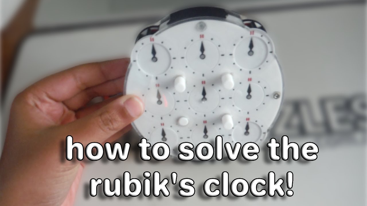 How to Solve the Rubik's Clock! (Flip Method) - YouTube