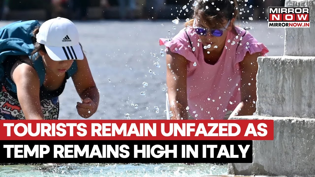 Italy Heatwave: Tourists in Rome unfazed as temperatures soar and 16 ...