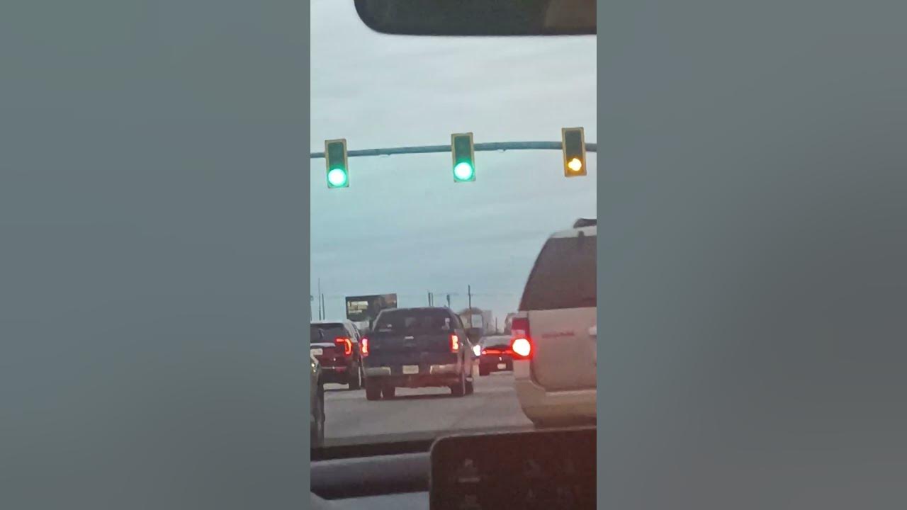 Left turn Yield on flashing yellow arrow 3-light traffic light - YouTube