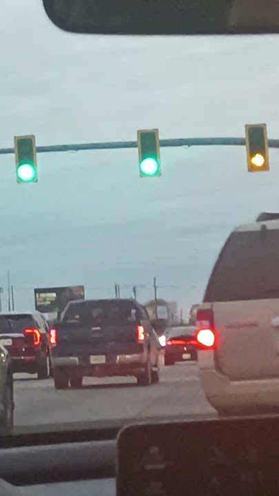 Left turn Yield on flashing yellow arrow 3-light traffic light - YouTube