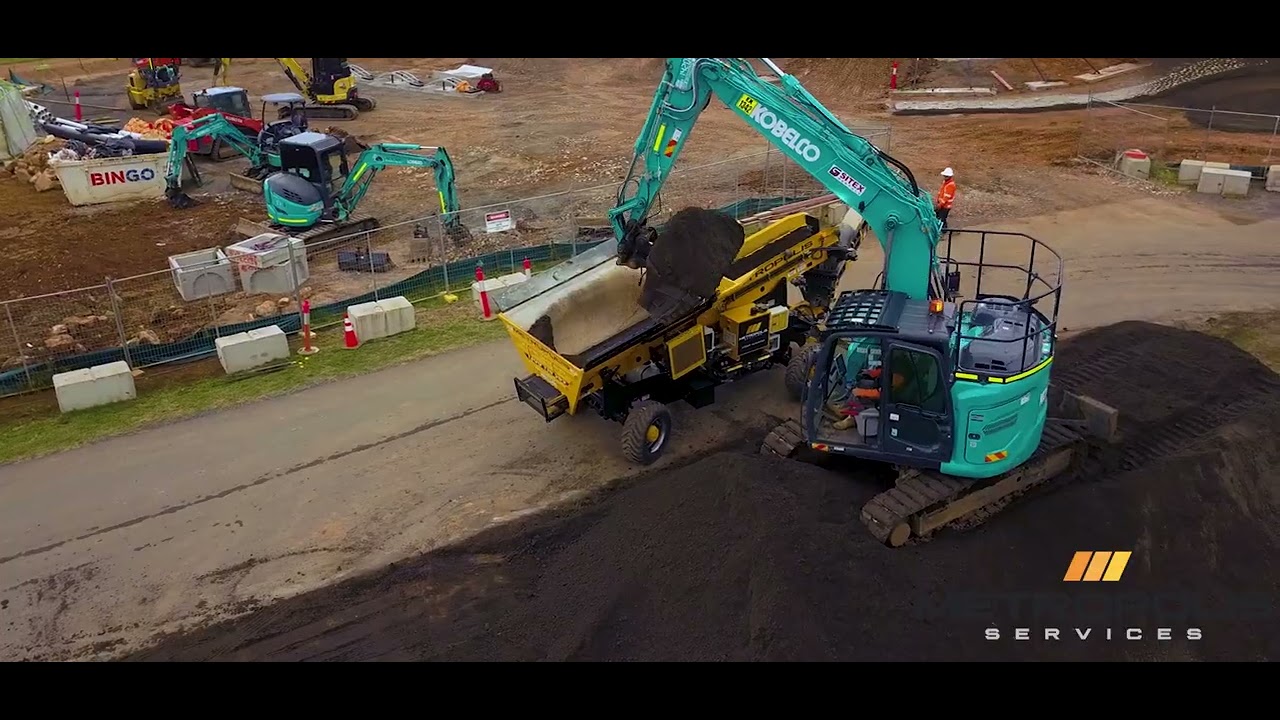 Detailed Topsoil Placement Using Stone Slinger - YouTube