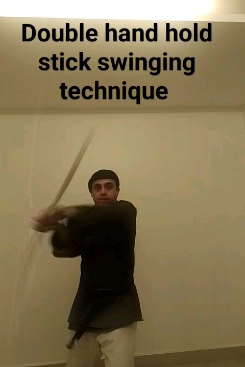 Double hand hold Stick Swinging Technique.. It is a form of figure 8 ...