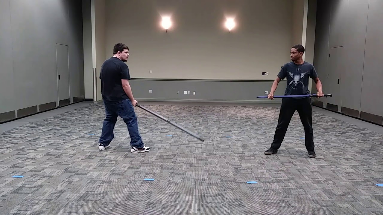 Staff vs Chaos Longsword - Enclosed Fight - YouTube