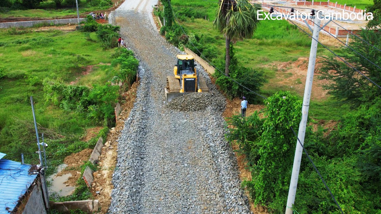 Bulldozer Cutting Stone And Dump Trailer Dumping Stone Building ...