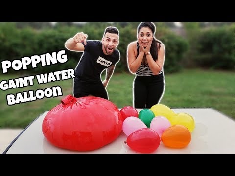 POPPING A GAINT WATER BALLOON IN SLOW MOTION!! | SUPER SATISFYING - YouTube