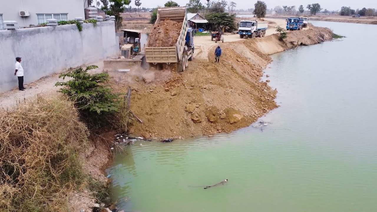 Project to widen the road on the deep canal using KOMATSU DOZER D31P ...