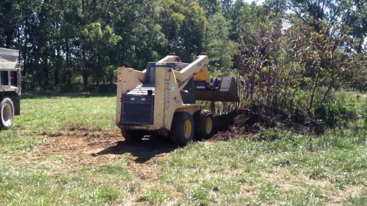Loading up the dump truck. - YouTube
